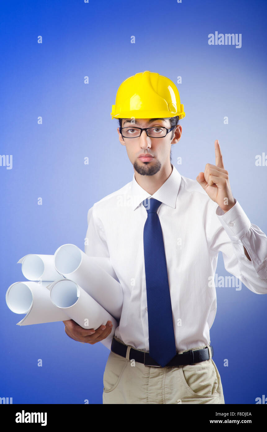 Young engineer working with drawings Stock Photo - Alamy