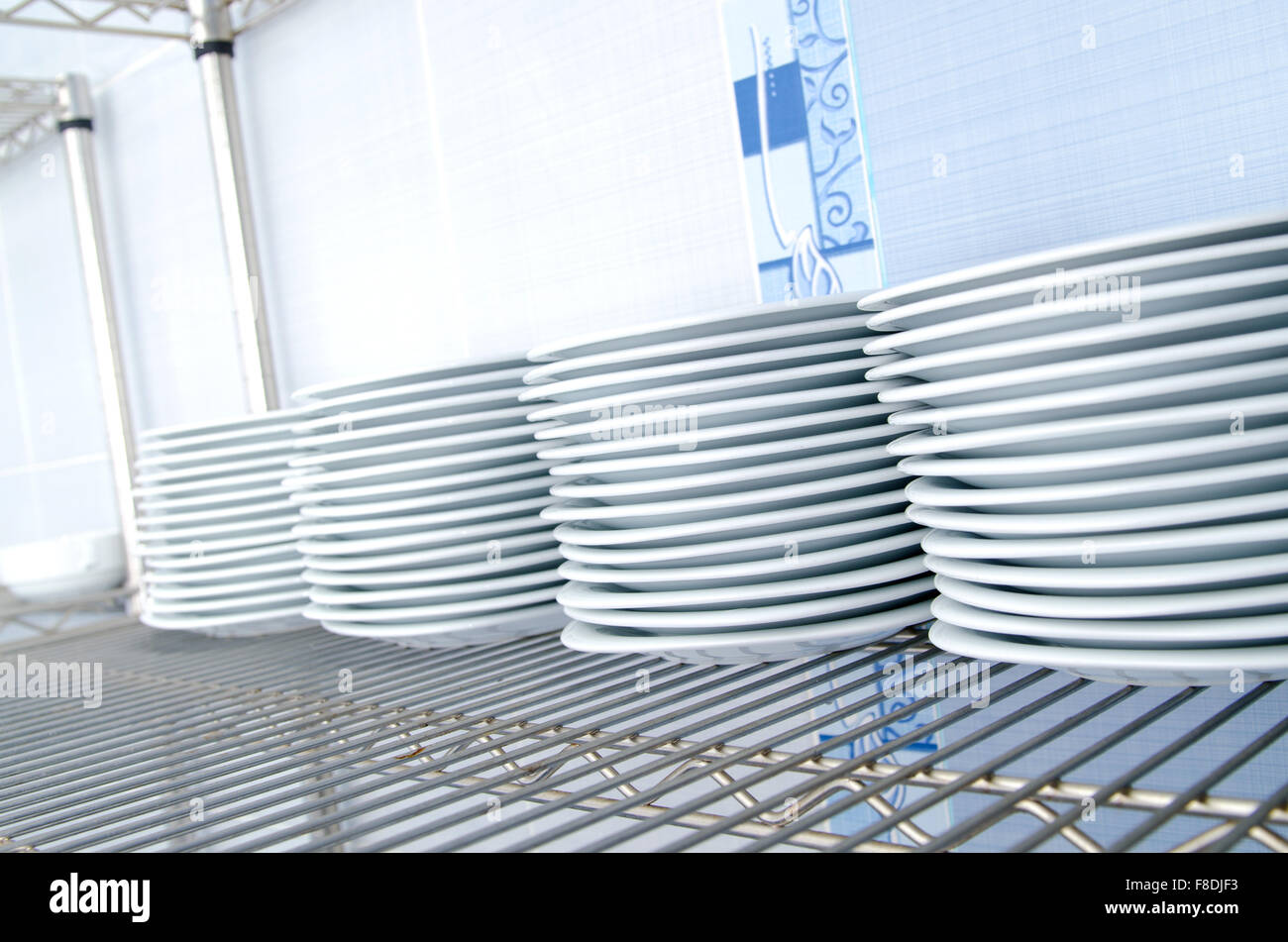 Many plates in the kitchen Stock Photo - Alamy