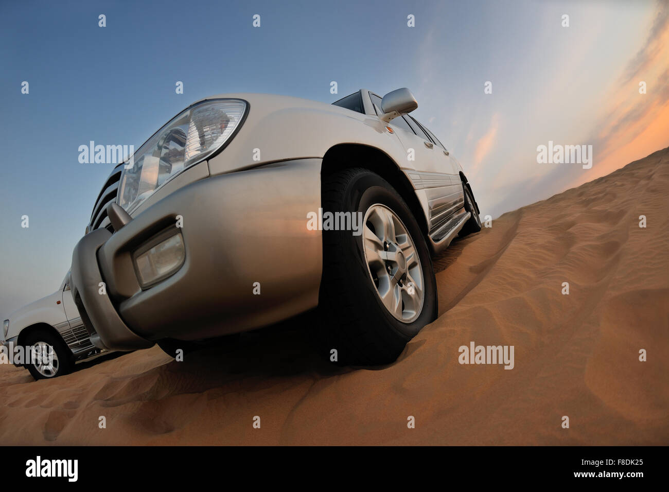 Desert Safari - Off-road jeep vehicles driving in the Arabian Desert at ...