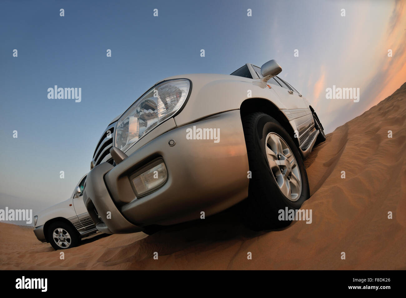 Desert Safari - Off-road jeep vehicles driving in the Arabian Desert at ...