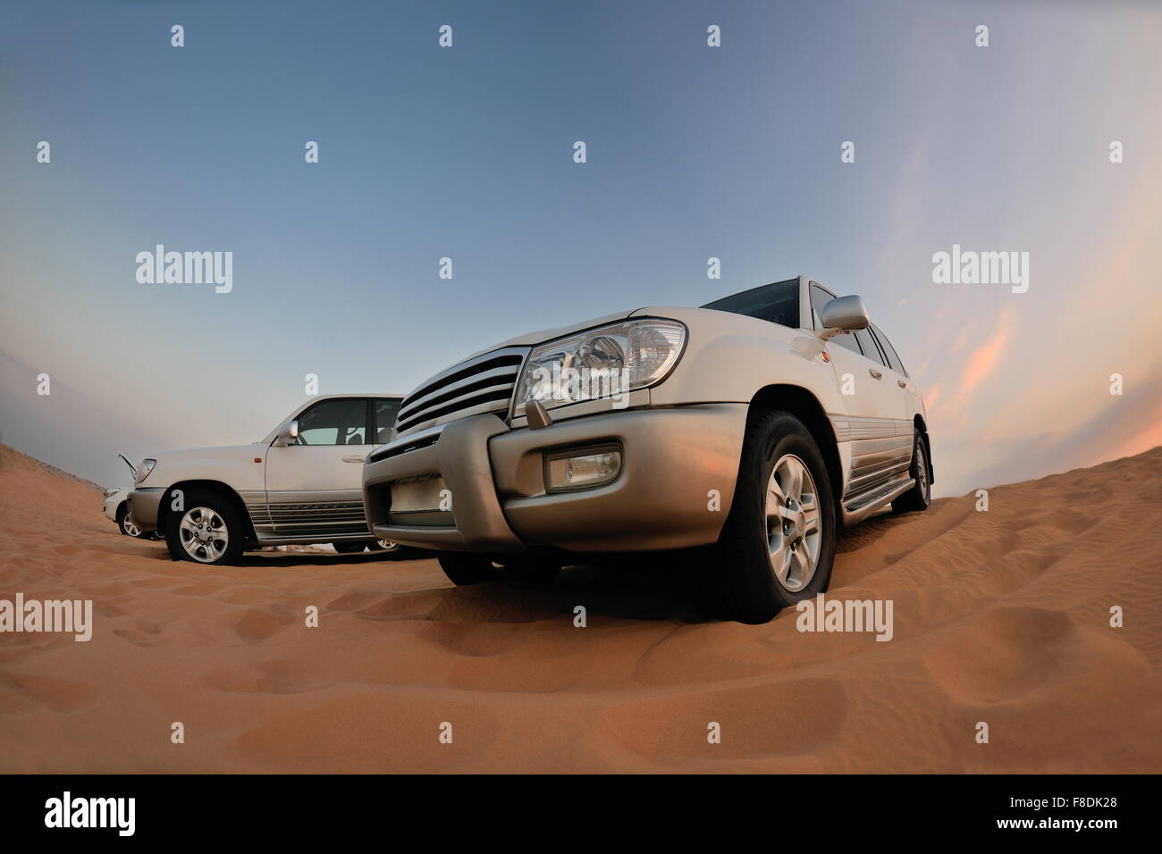 Desert Safari - Off-road jeep vehicles driving in the Arabian Desert at ...