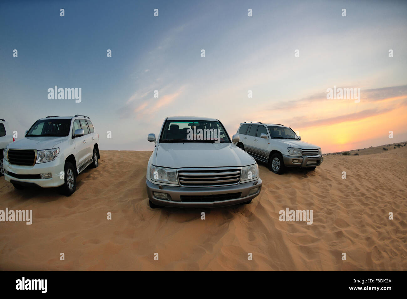 Desert Safari - Off-road jeep vehicles driving in the Arabian Desert at ...