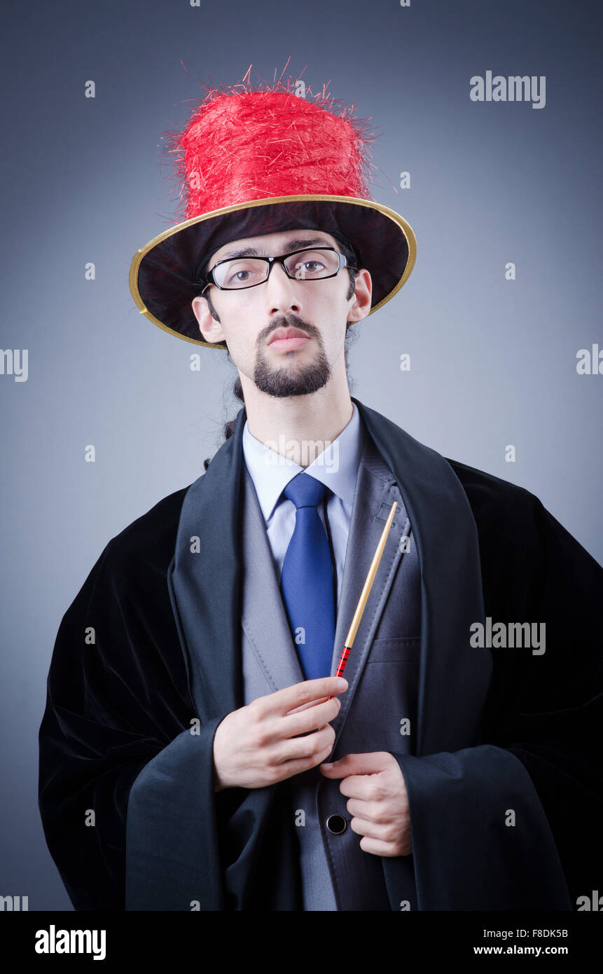Magician in the business suit Stock Photo - Alamy