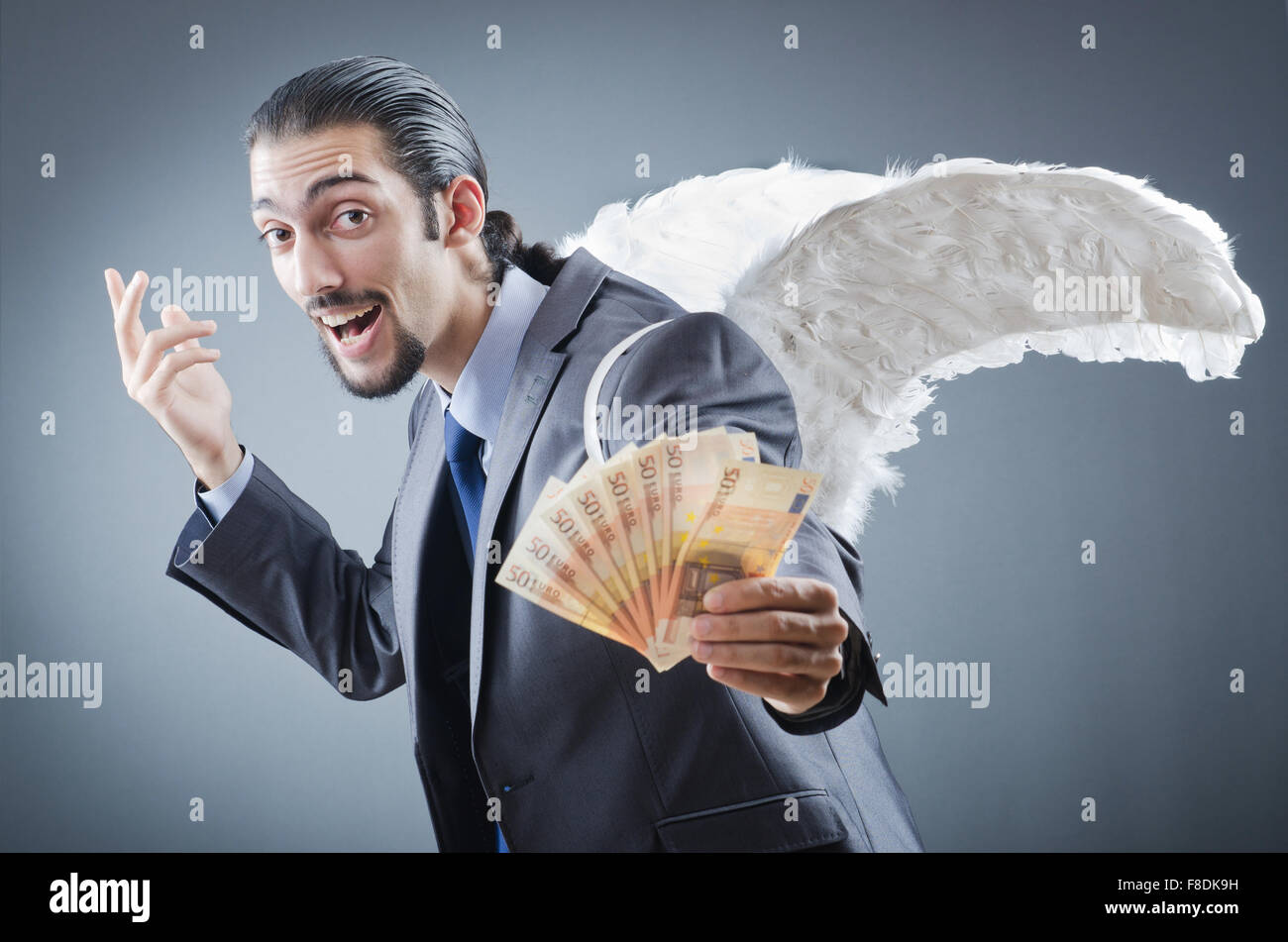 Business angel with money Stock Photo - Alamy