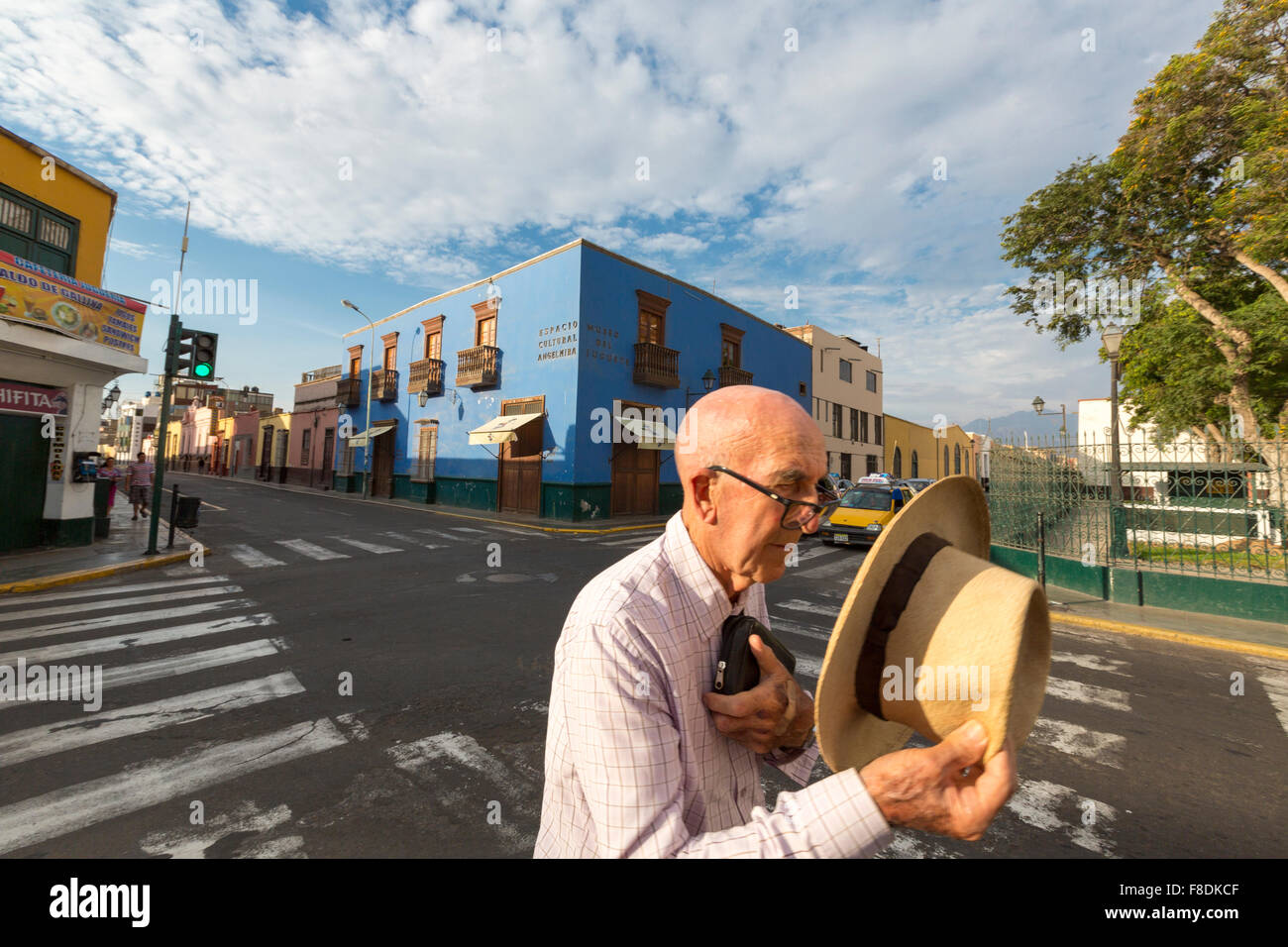 Man saying hello with his hat in Peru Stock Photo - Alamy