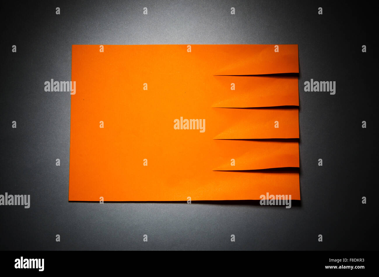 Tear off paper notice on the wall Stock Photo - Alamy