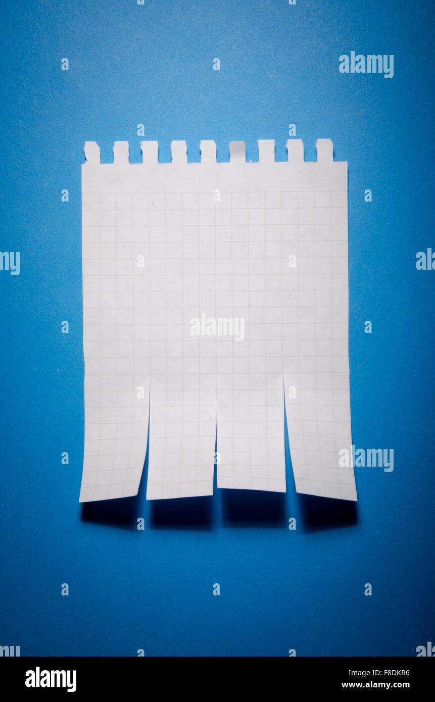 Tear off paper notice on the wall Stock Photo - Alamy