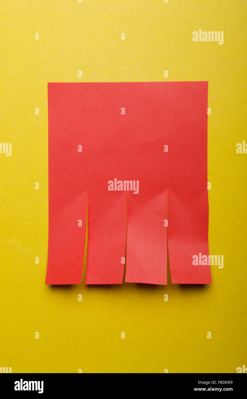 Tear off paper notice on the wall Stock Photo - Alamy