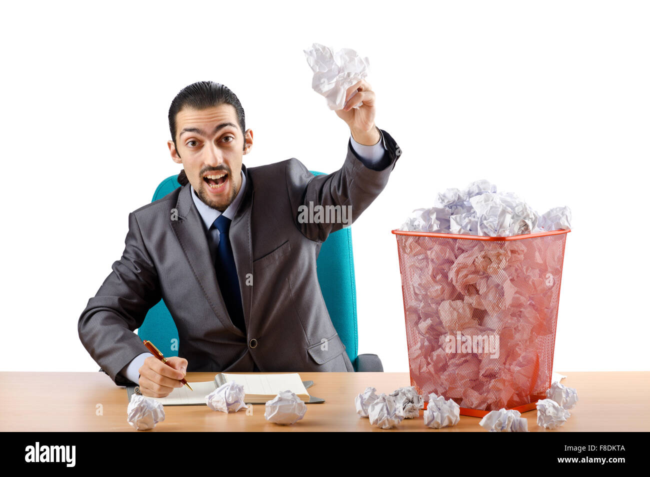 Man with lots of wasted paper Stock Photo - Alamy