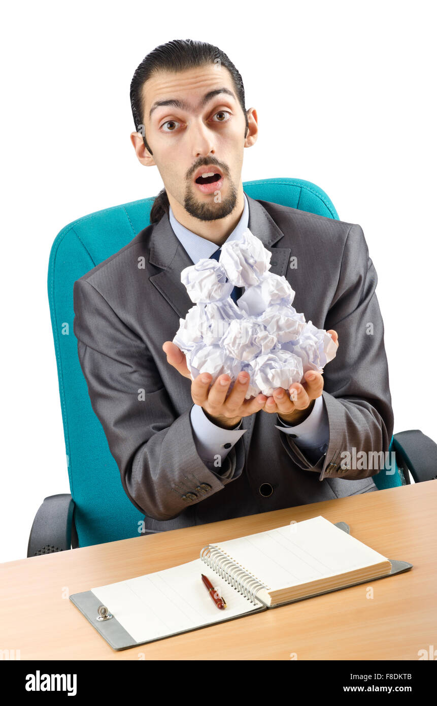 Man with lots of wasted paper Stock Photo - Alamy