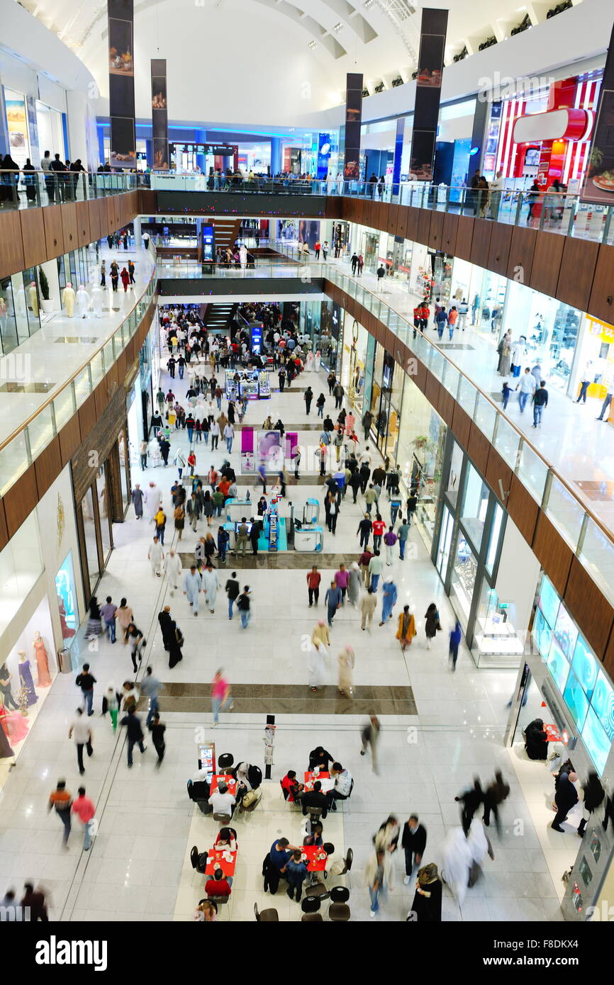 crowd shopper people in Interior of a modern shopping mall center Stock Photo - Alamy