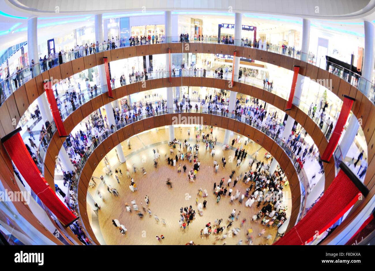crowd shopper people in Interior of a modern shopping mall center Stock Photo - Alamy
