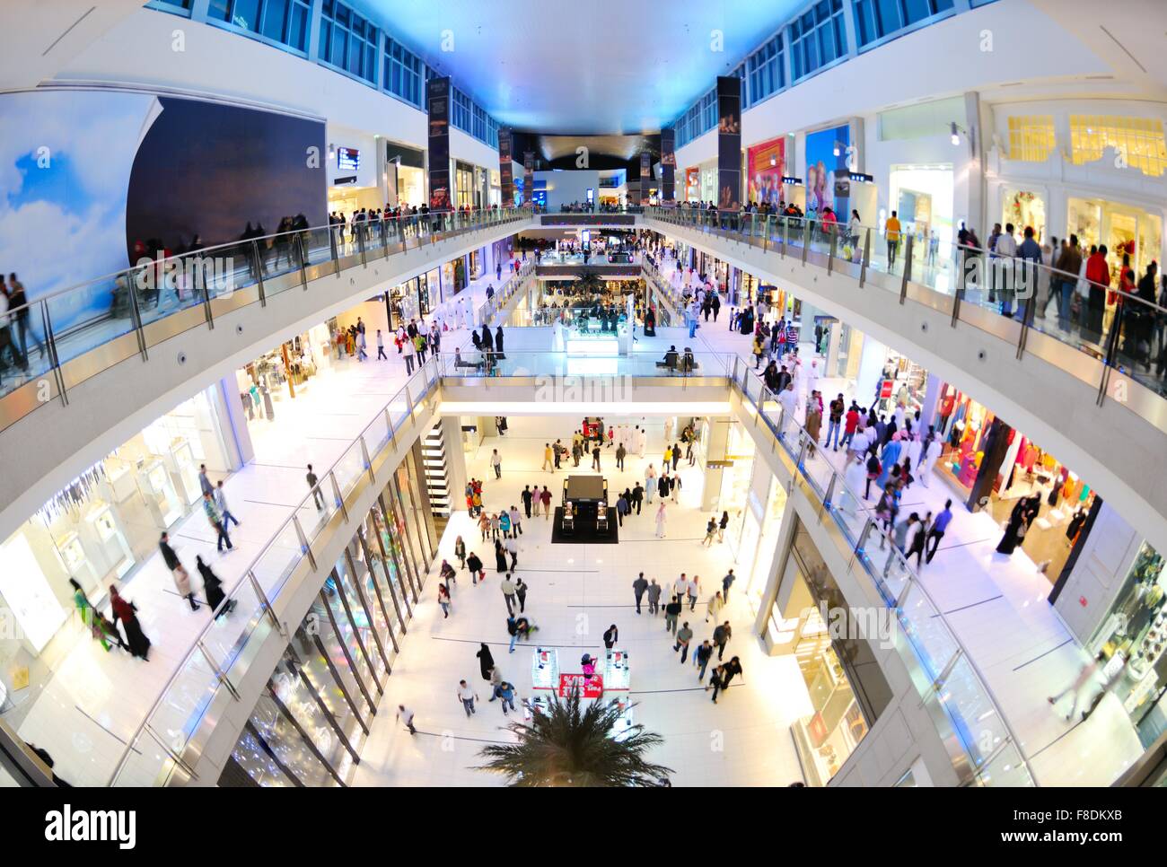 crowd shopper people in Interior of a modern shopping mall center Stock Photo - Alamy