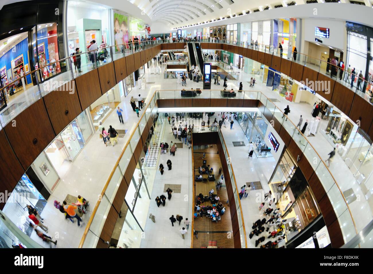 crowd shopper people in Interior of a modern shopping mall center Stock Photo - Alamy