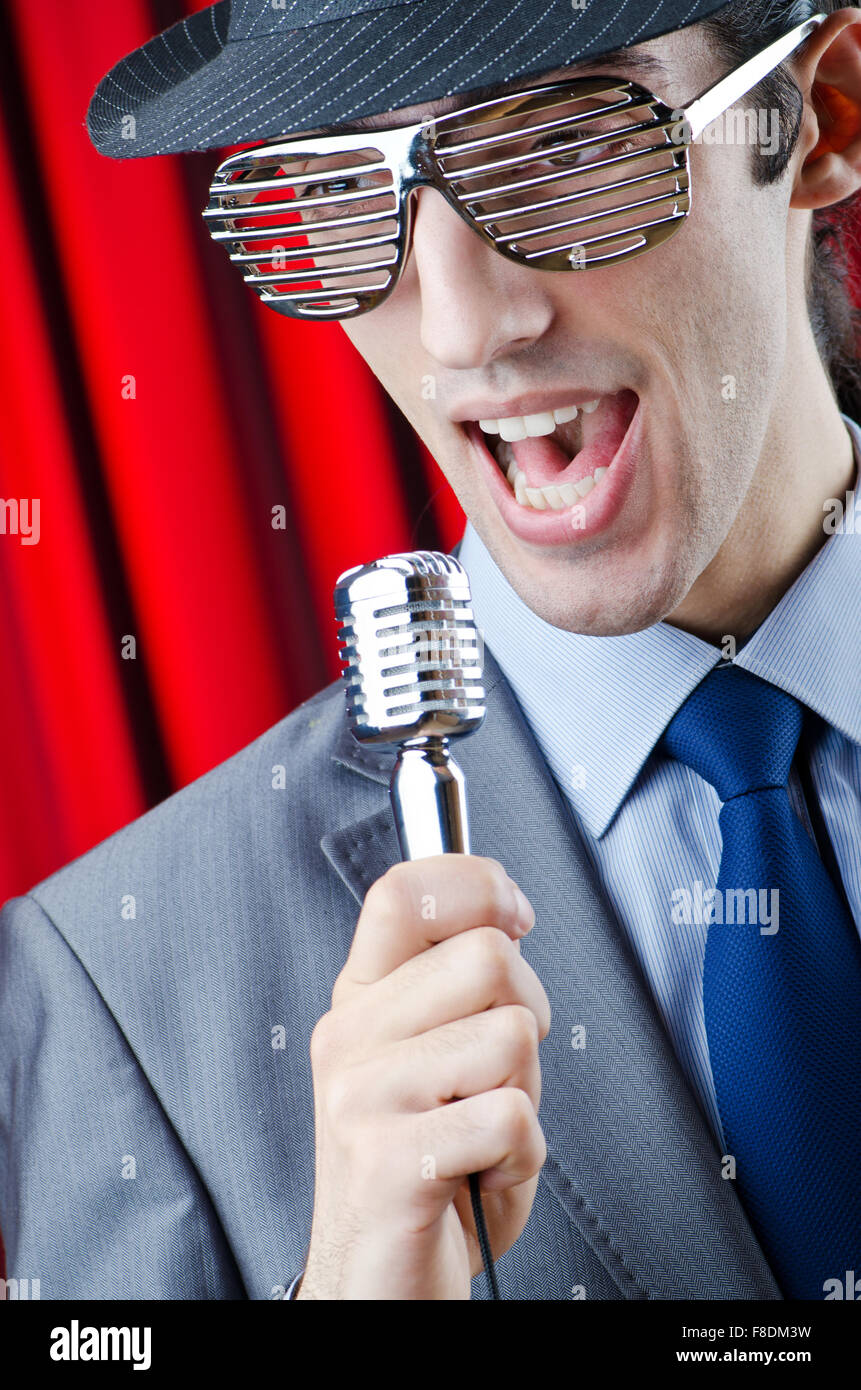 Man performing at the concert Stock Photo - Alamy