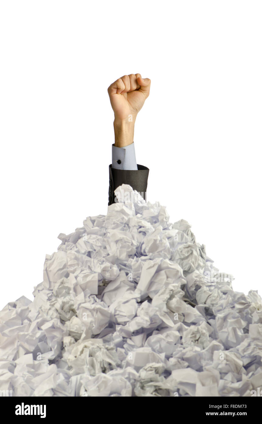 Man with lots of crumpled paper Stock Photo - Alamy