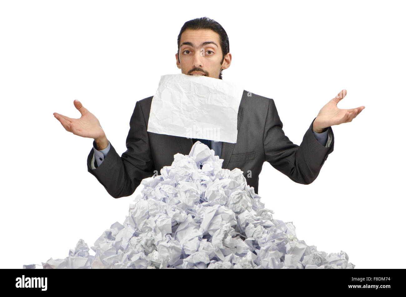 Man with lots of crumpled paper Stock Photo - Alamy