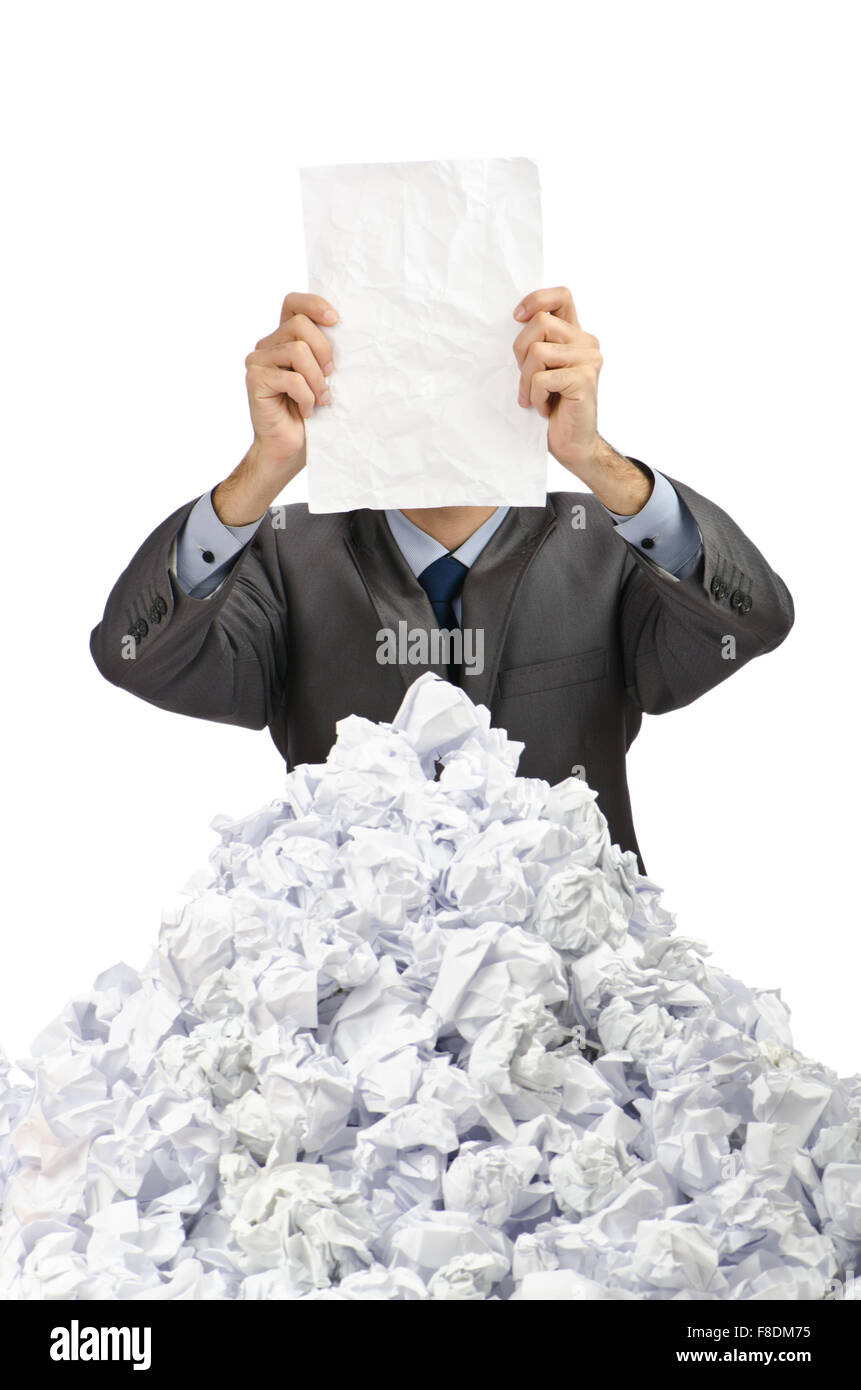 Man with lots of crumpled paper Stock Photo - Alamy