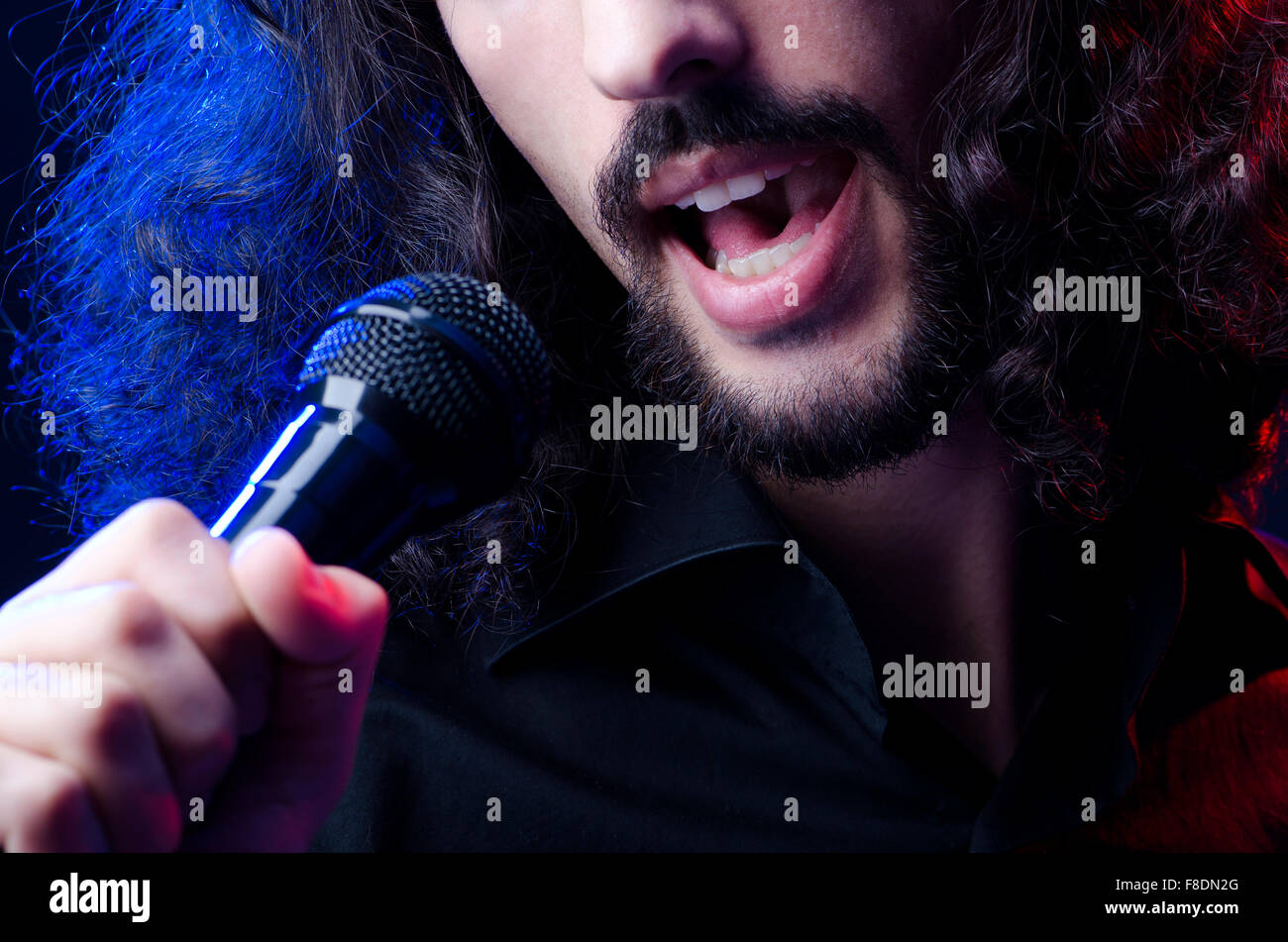 Man singing at the concert Stock Photo - Alamy
