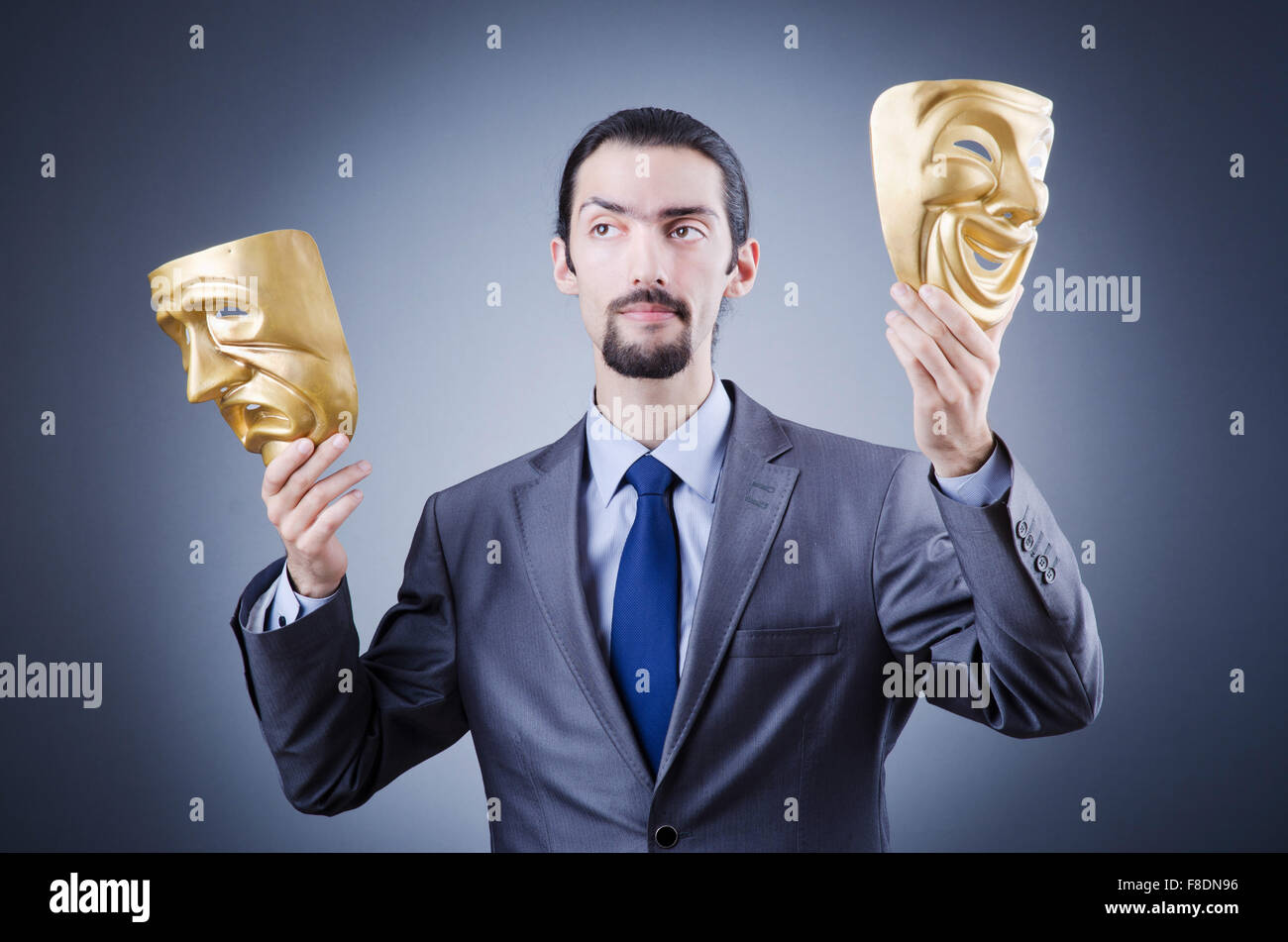 Businessman with mask concealing his identity Stock Photo - Alamy
