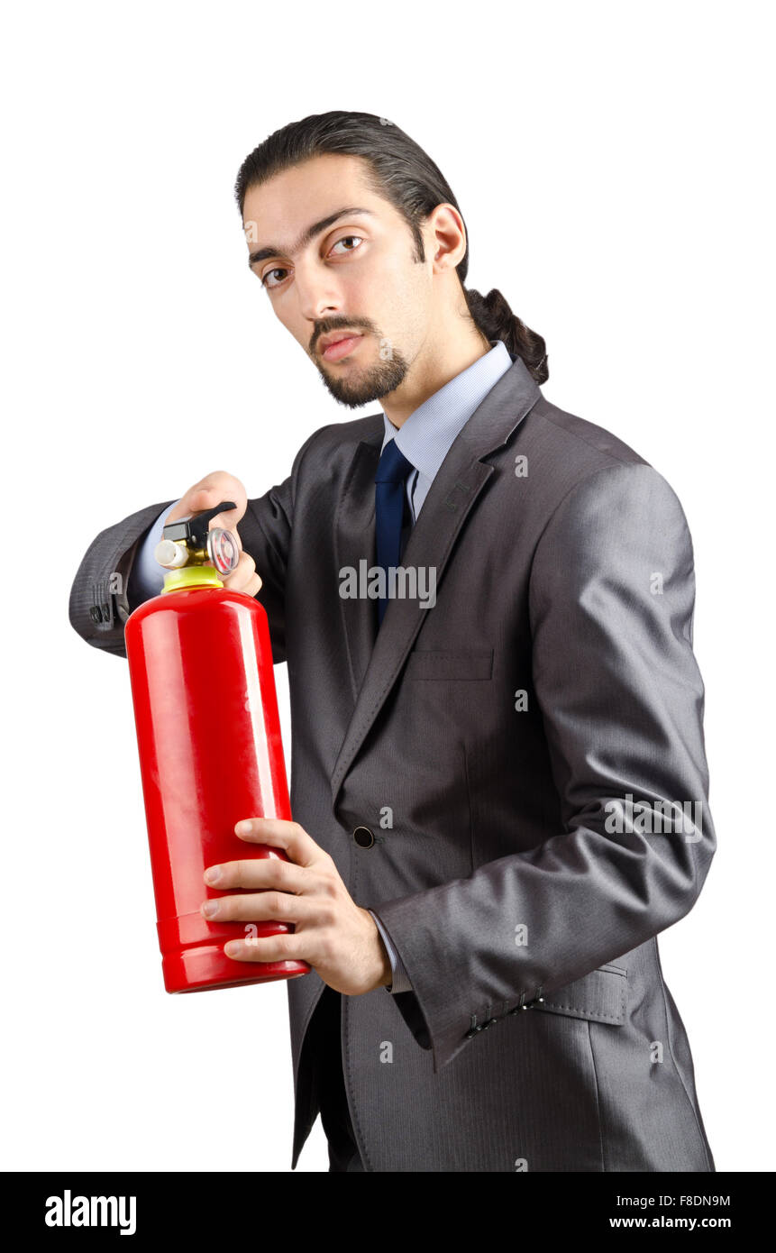 Man with fire extinguisher in firefighting concept Stock Photo - Alamy