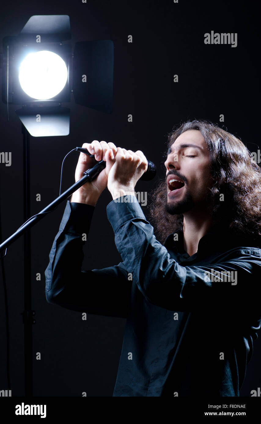 Man singing at the concert Stock Photo - Alamy