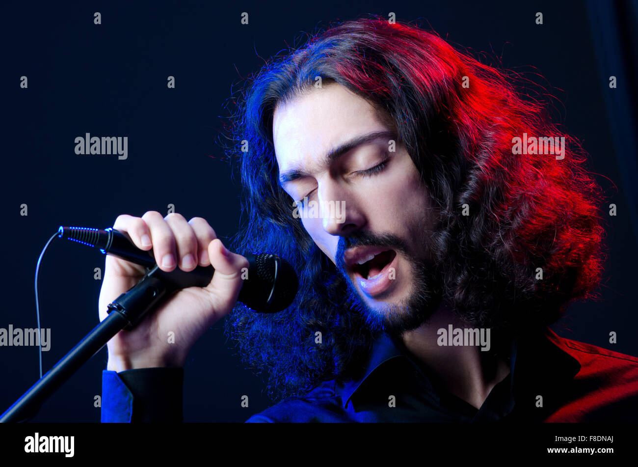 Man singing at the concert Stock Photo - Alamy
