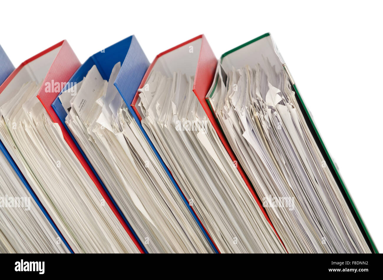 Pile of folders full of papers Stock Photo - Alamy