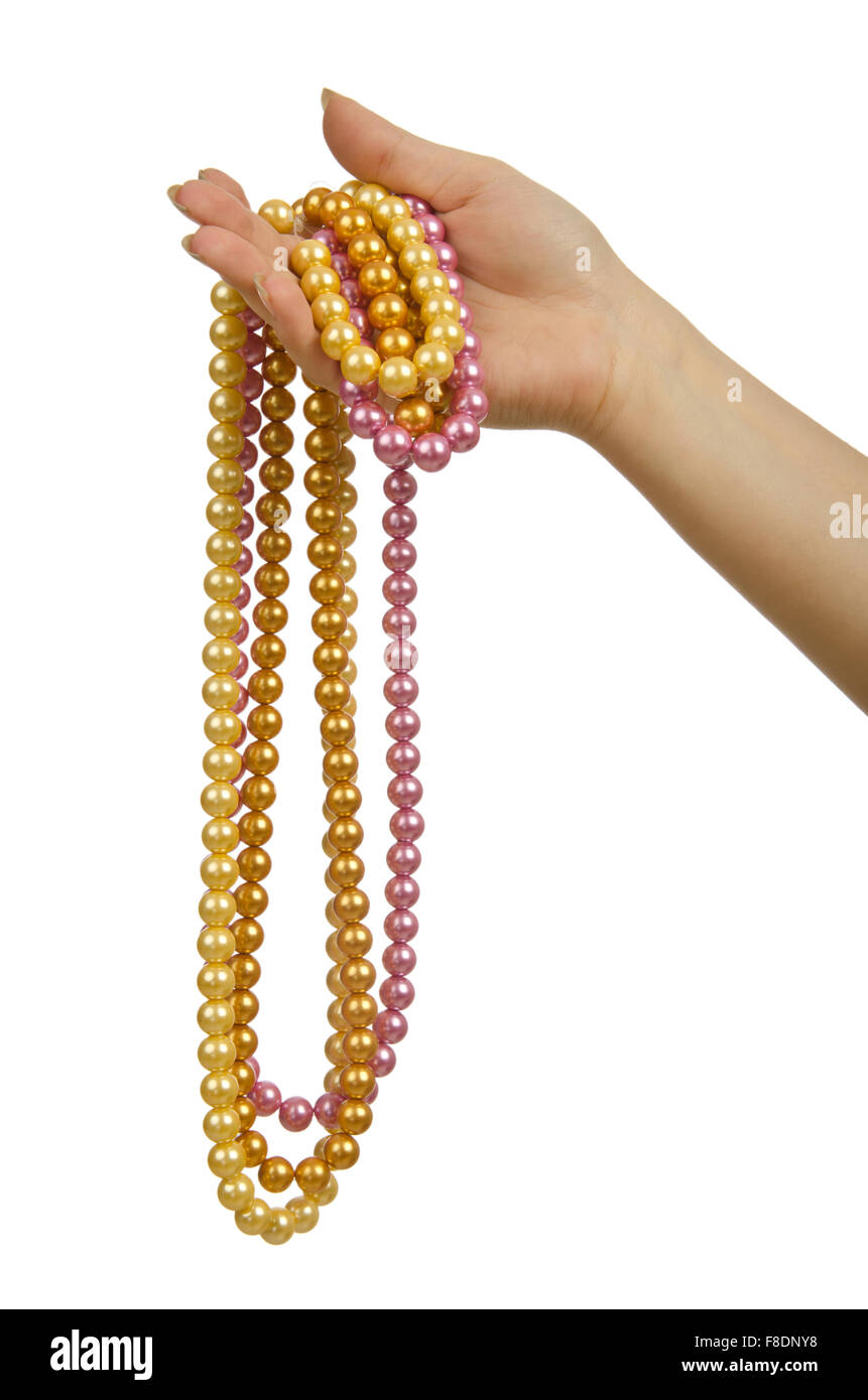 Pearl necklace in hand on white Stock Photo - Alamy