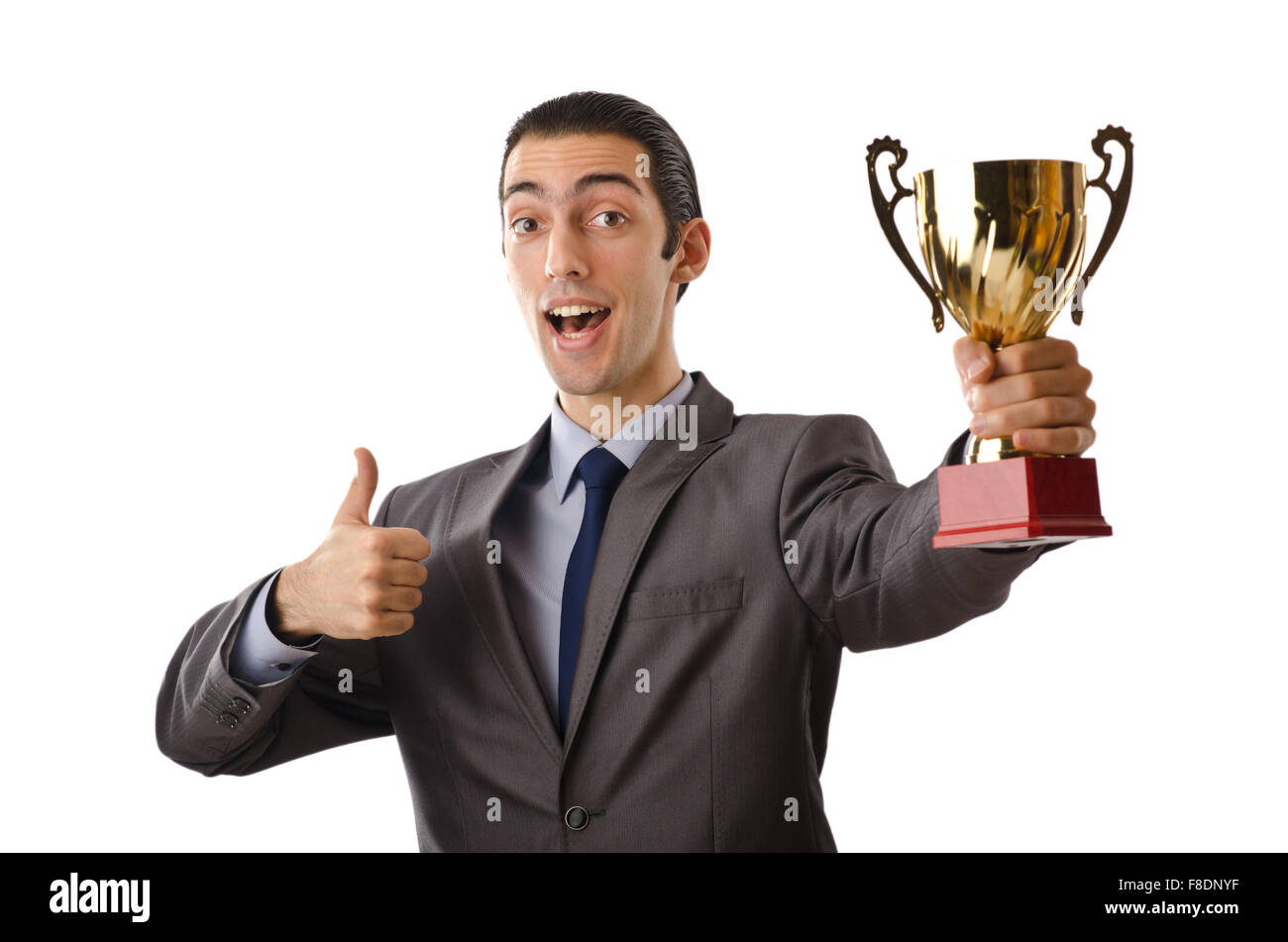 Man being awarded with golden cup Stock Photo - Alamy
