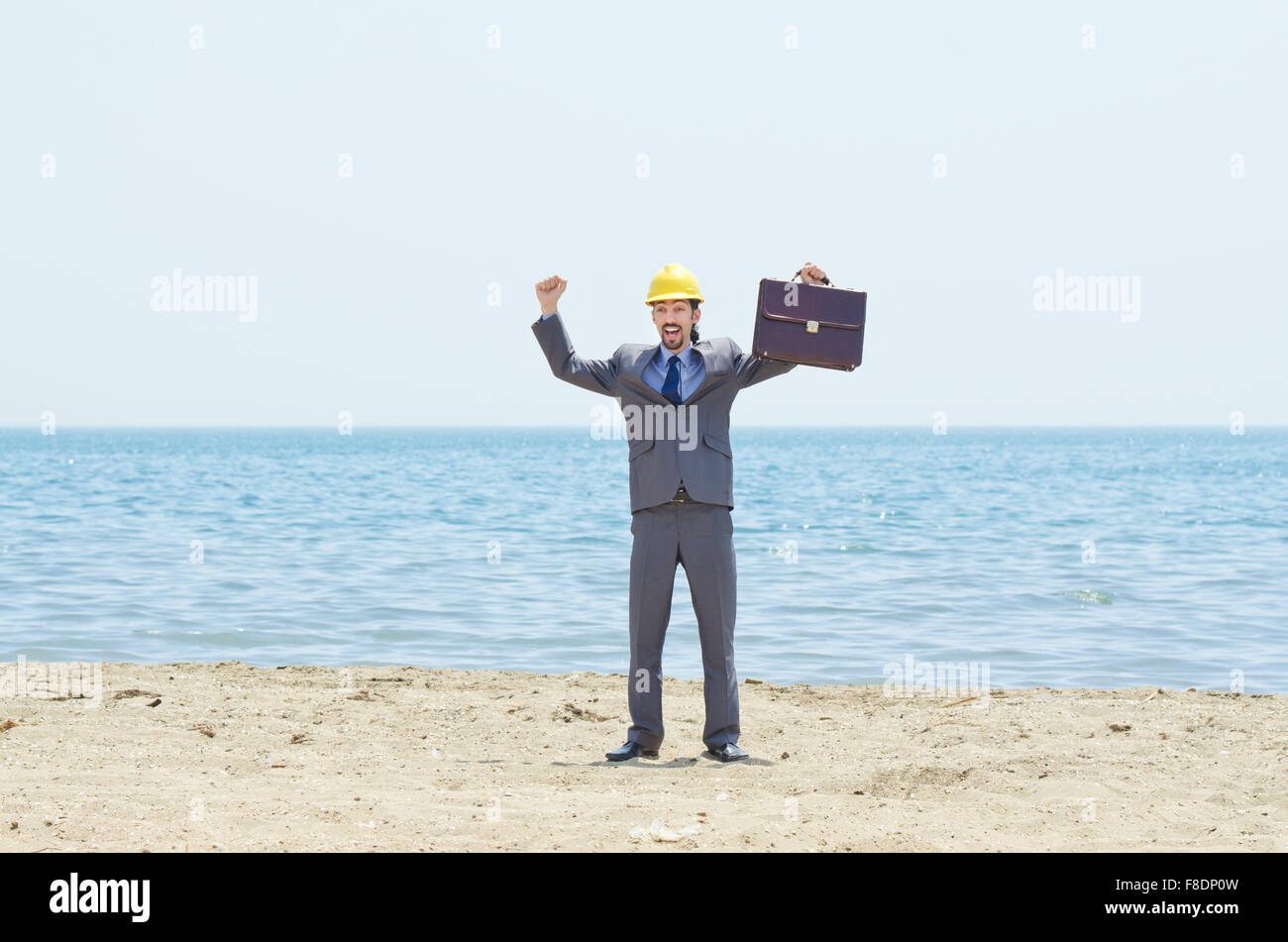 Oil engineer on sea side beach Stock Photo - Alamy