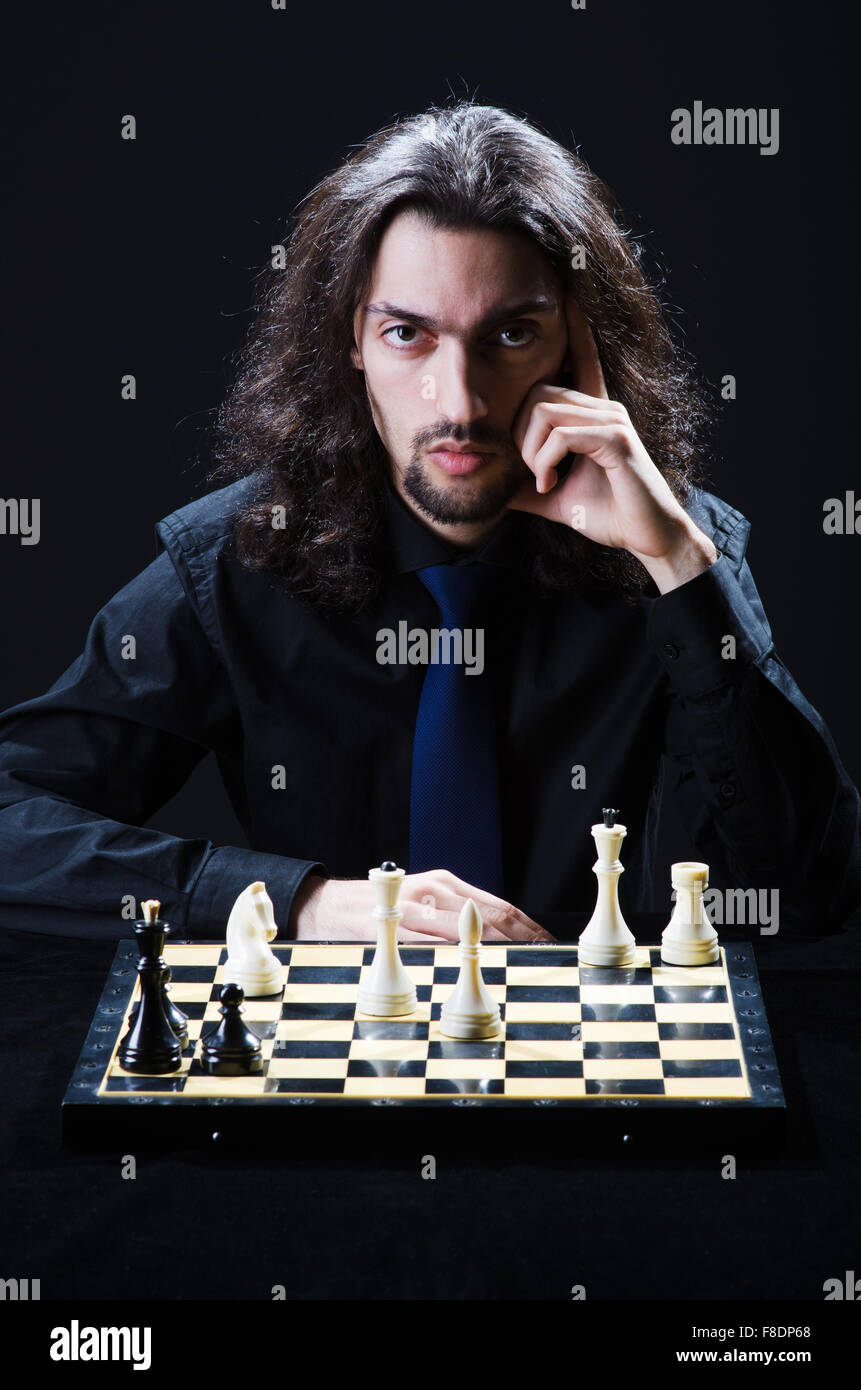 Chess player playing his game Stock Photo - Alamy