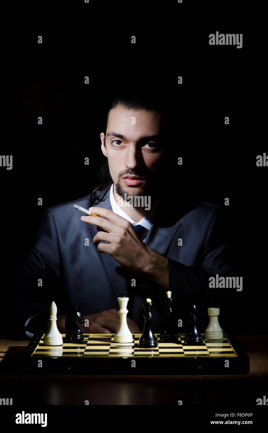 Chess player playing his game Stock Photo - Alamy