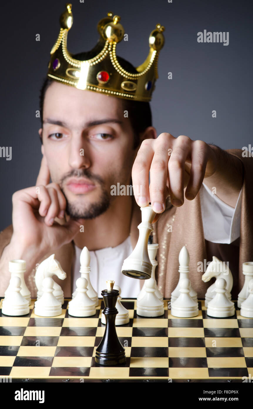 Chess player playing his game Stock Photo - Alamy