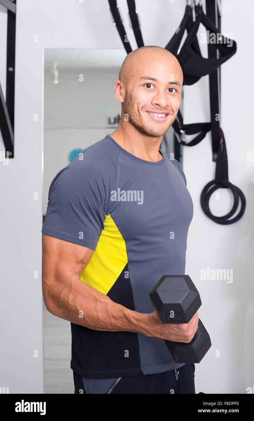 a man lifting weights at the gym Stock Photo - Alamy a man lifting weights at the gym Stock Photo - Alamy