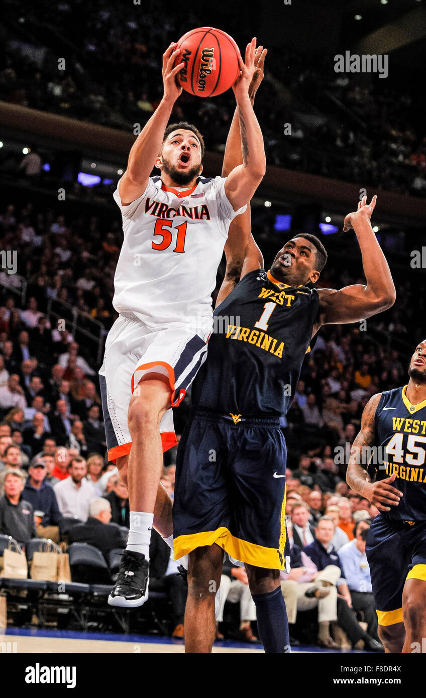 New York, USA. 8th Dec, 2015. Virginia's Darius Thompson drives to the ...