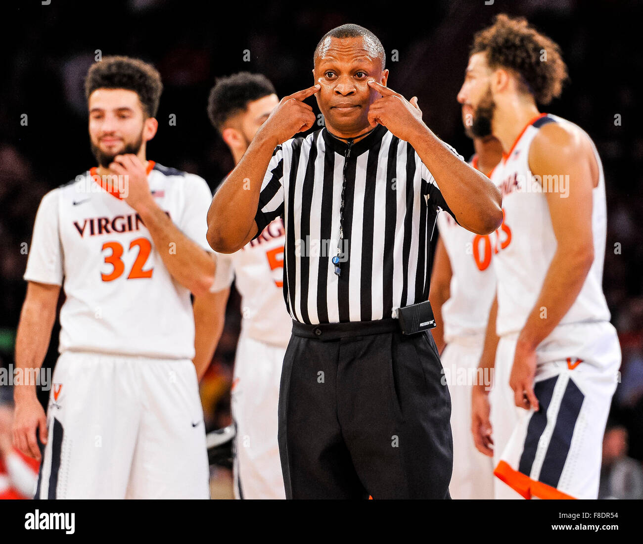 New York, USA. 8th Dec, 2015. The referees exchanges some words, and ...