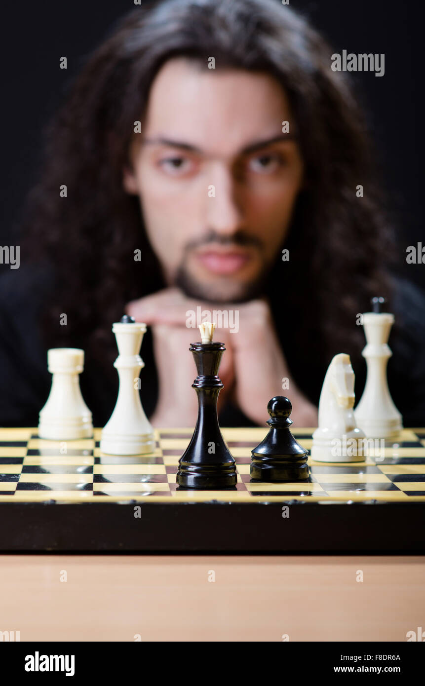 Chess player playing his game Stock Photo - Alamy