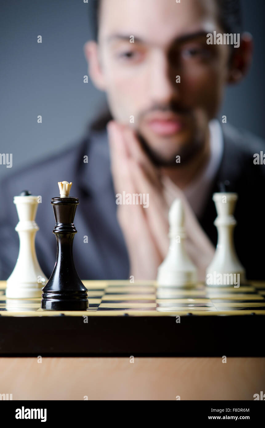 Chess player playing his game Stock Photo - Alamy