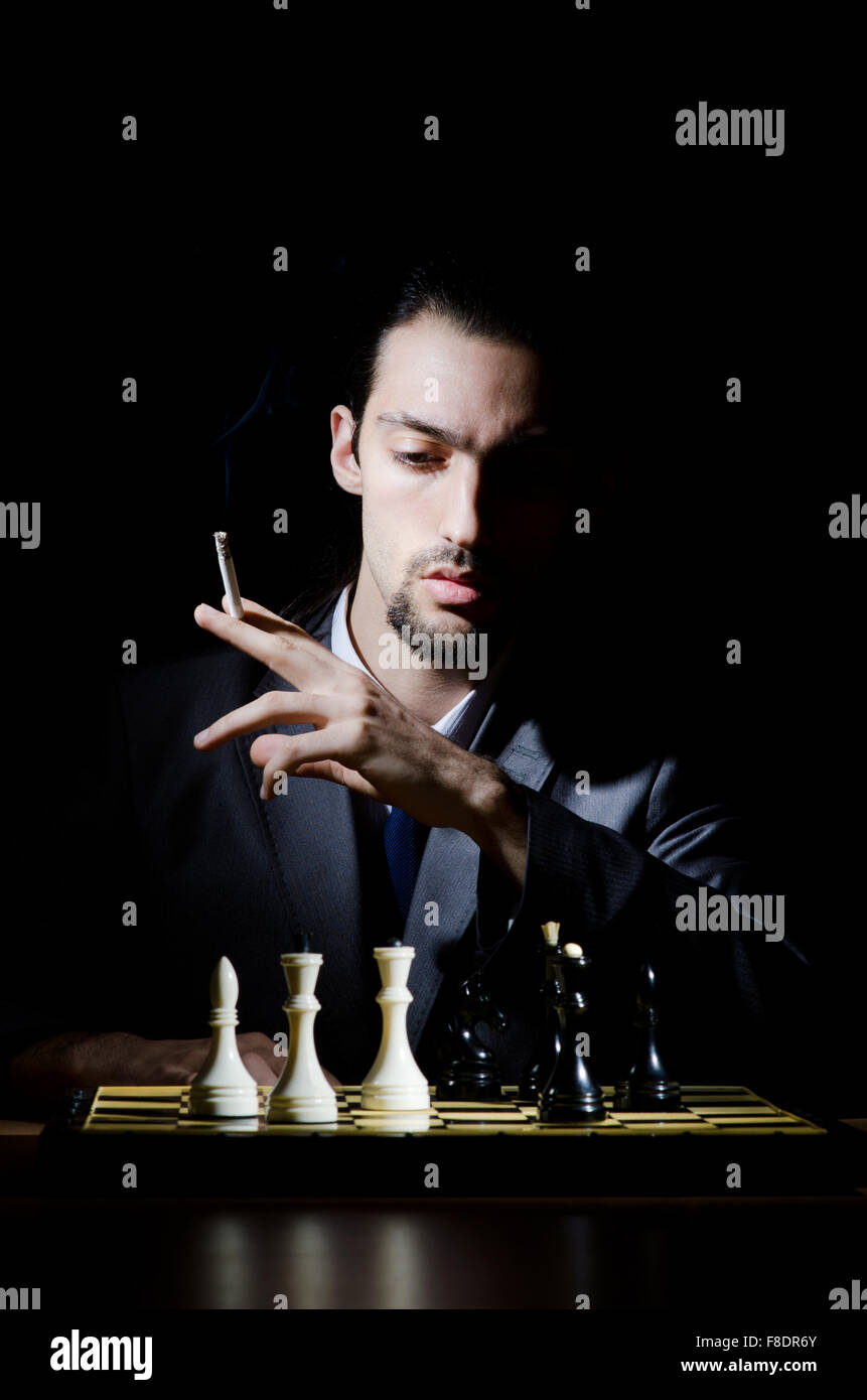 Chess player playing his game Stock Photo - Alamy