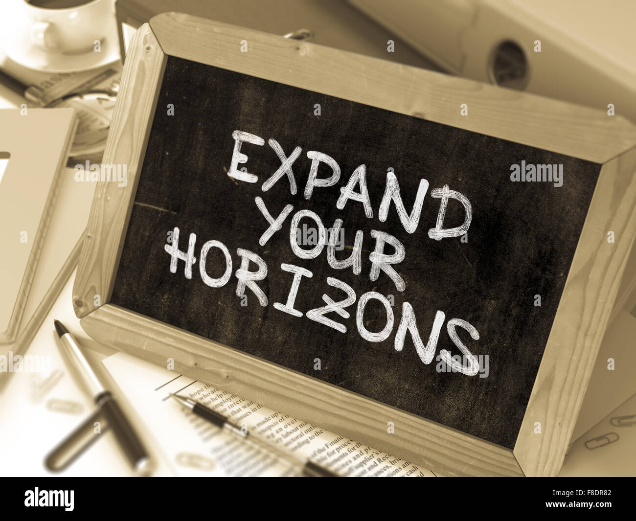 Expand Your Horizons. Motivation Quote a Blackboard Stock Photo - Alamy