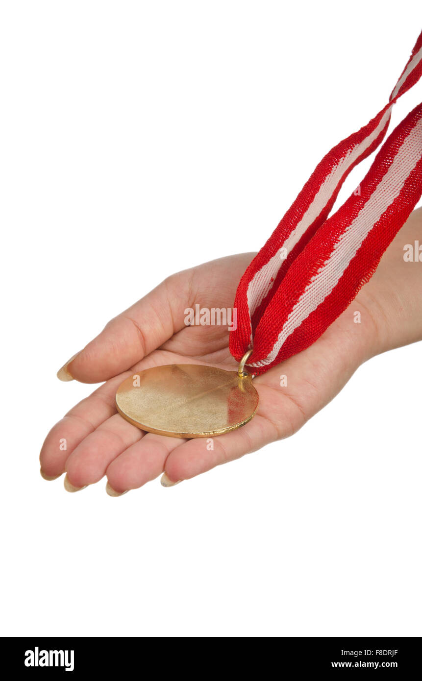 Hand holding gold medal on white Stock Photo - Alamy