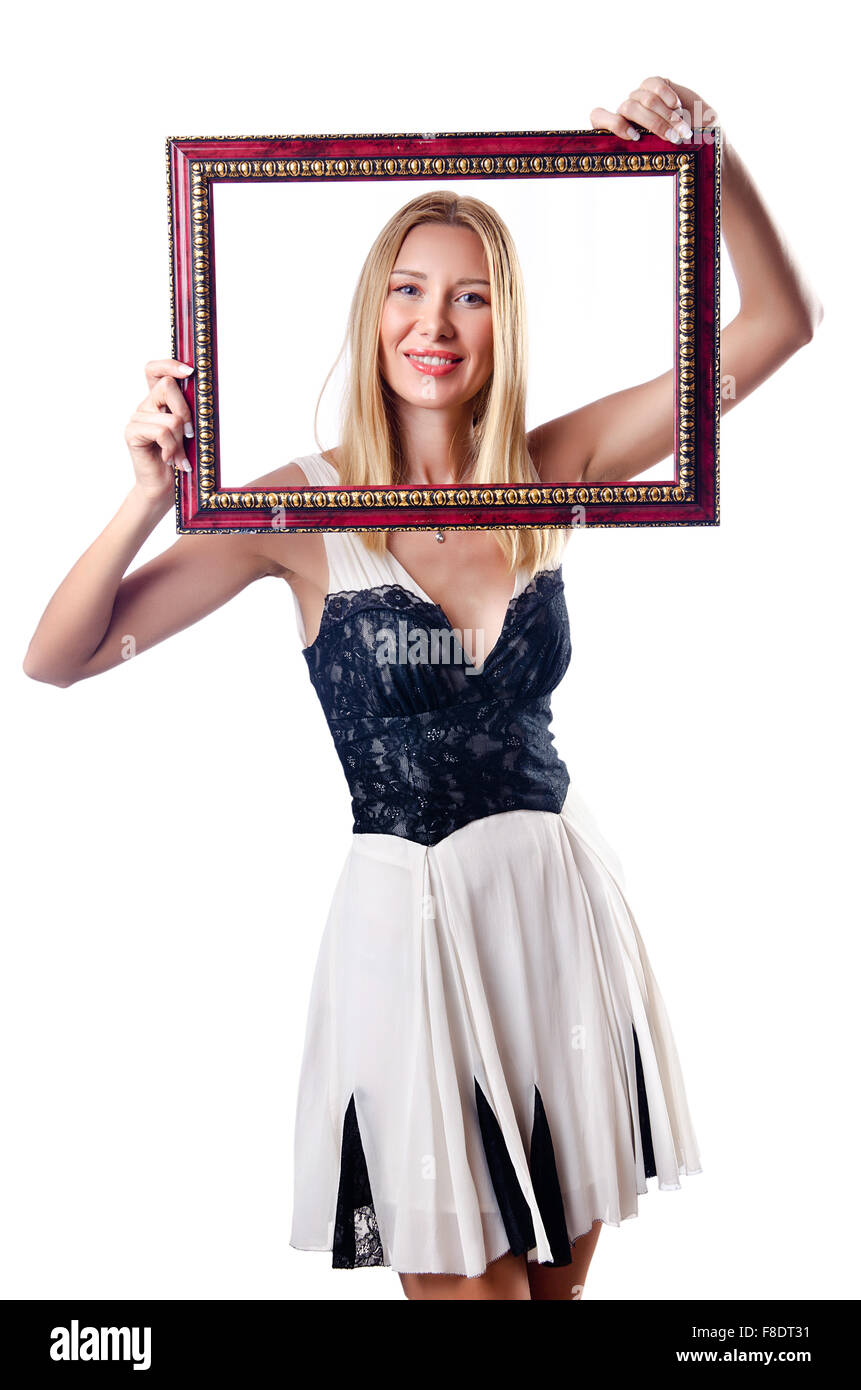 Young woman with picture frame on white Stock Photo - Alamy