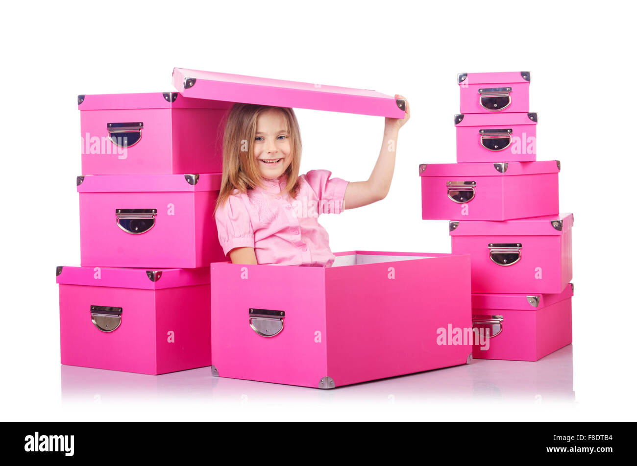 Little cute girl with lots of boxes Stock Photo - Alamy