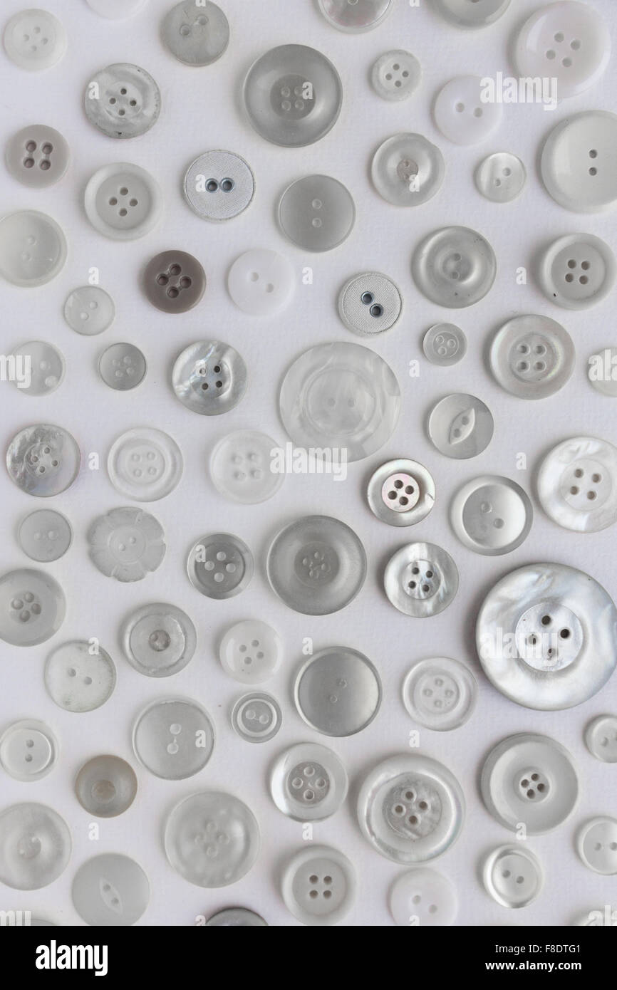 many clothing buttons on white background - fashion pattern Stock Photo ...