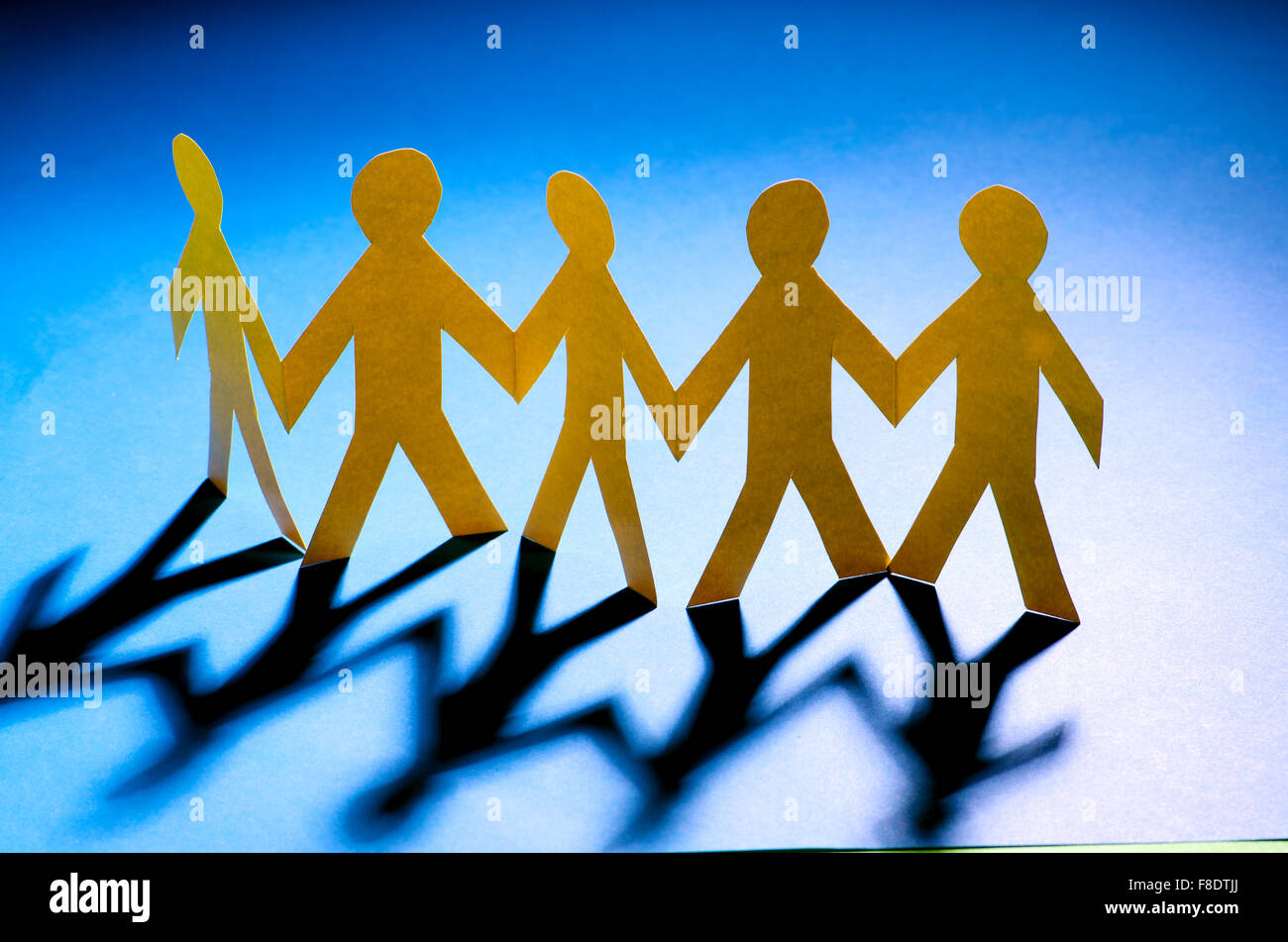 Paper people in teamworking concept Stock Photo - Alamy