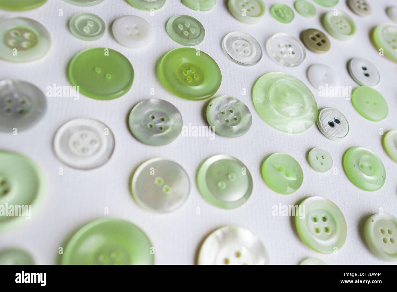 green buttons on white background - color group Stock Photo - Alamy