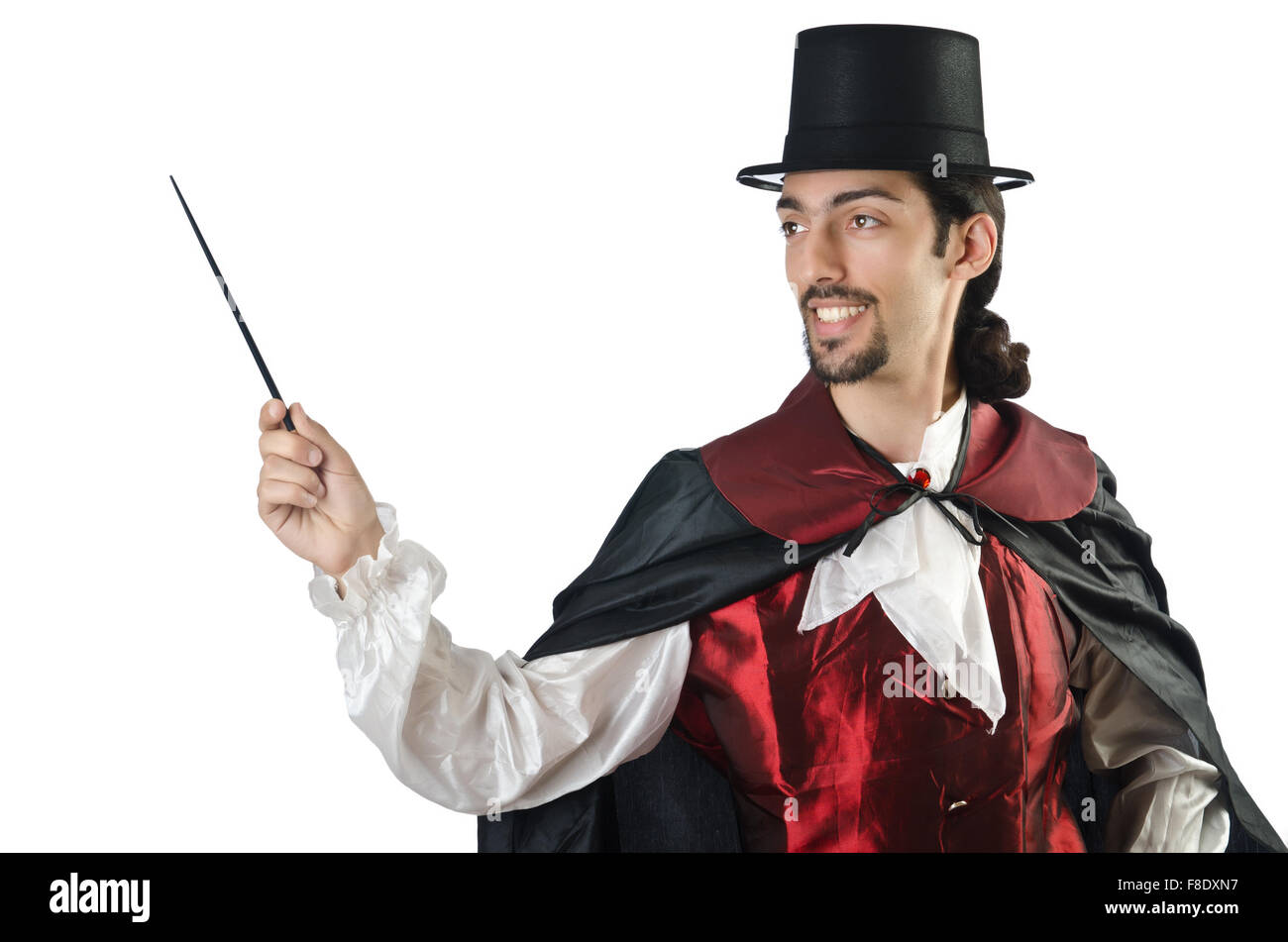 Magician doing tricks on white Stock Photo - Alamy