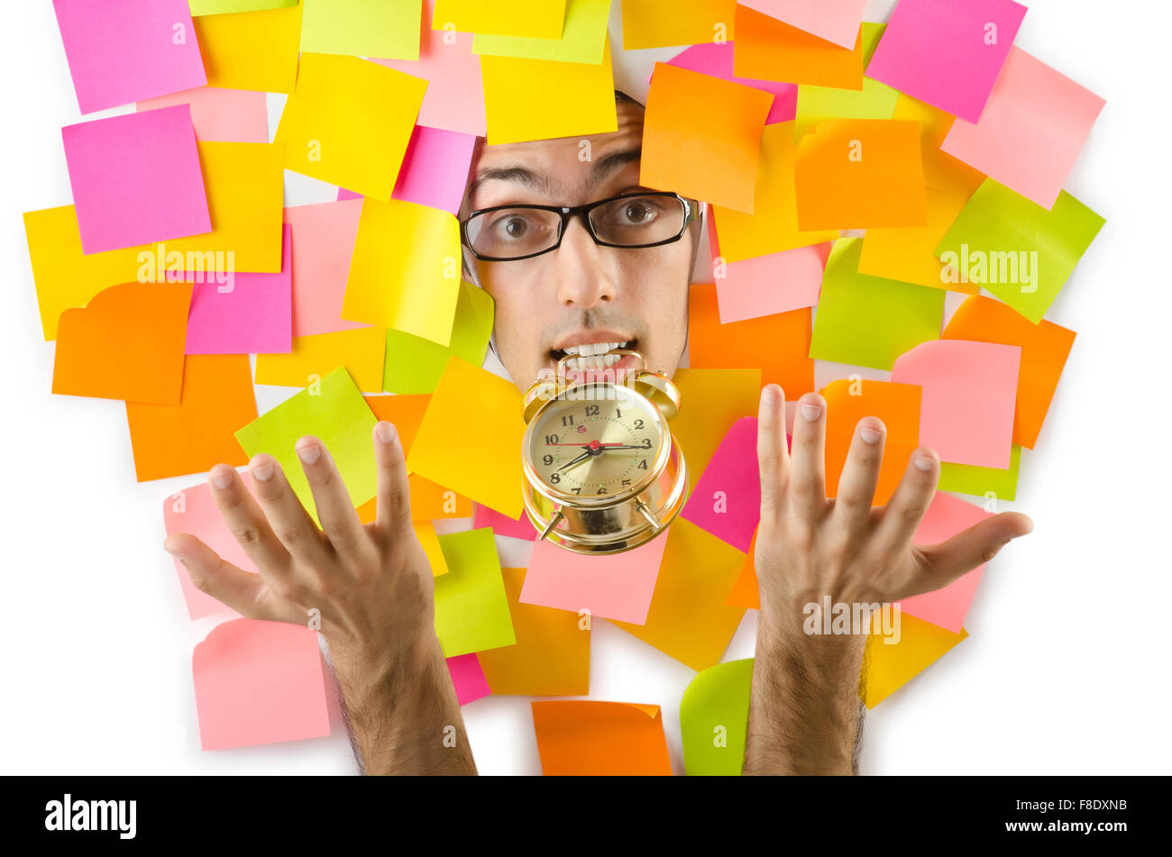 Man's face through paper and reminders Stock Photo - Alamy