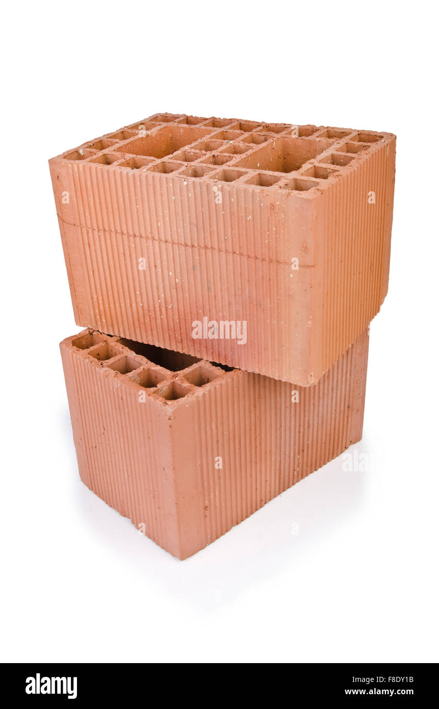 Stack of clay bricks isolated on white Stock Photo - Alamy